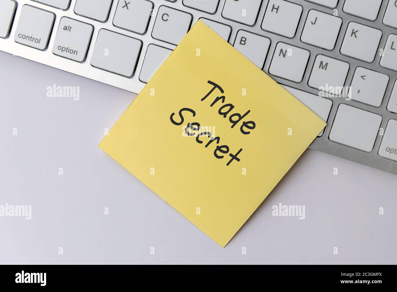 Trade Secret text on paper note stick on computer keyboard Stock Photo ...