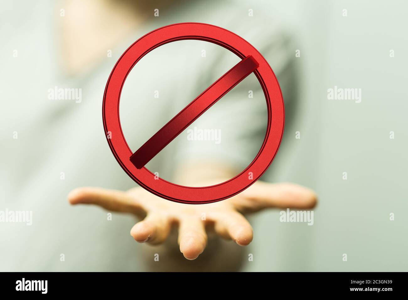 Illustration of a stop sign on top of a hand of man Stock Photo - Alamy