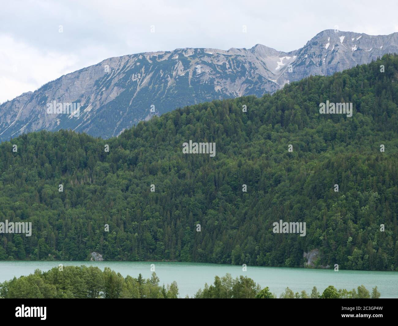 The lake Weissensee in the bavarian region Allgaeu near the little town ...