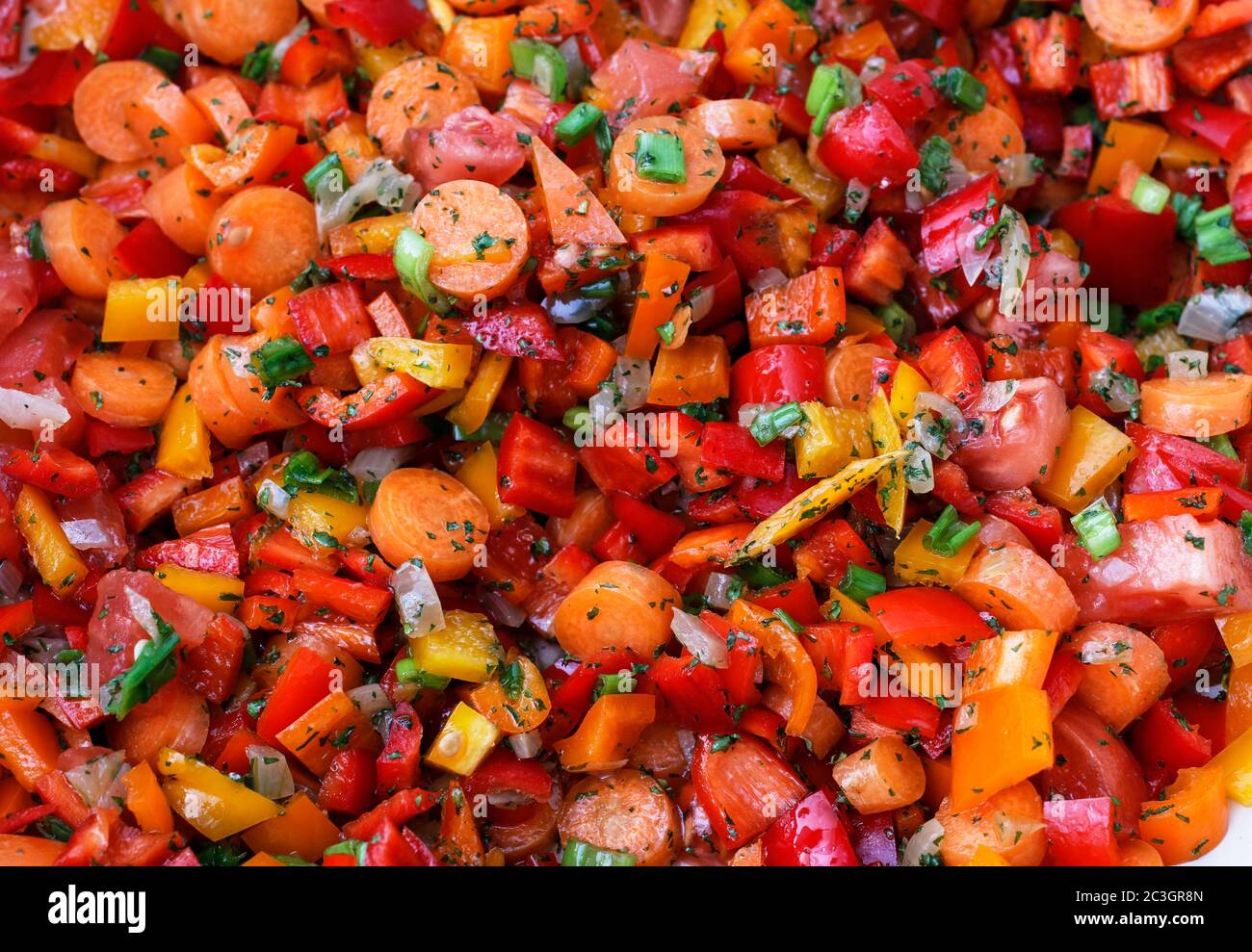 Cut mixed vegetables in frying hi-res stock photography and images - Alamy