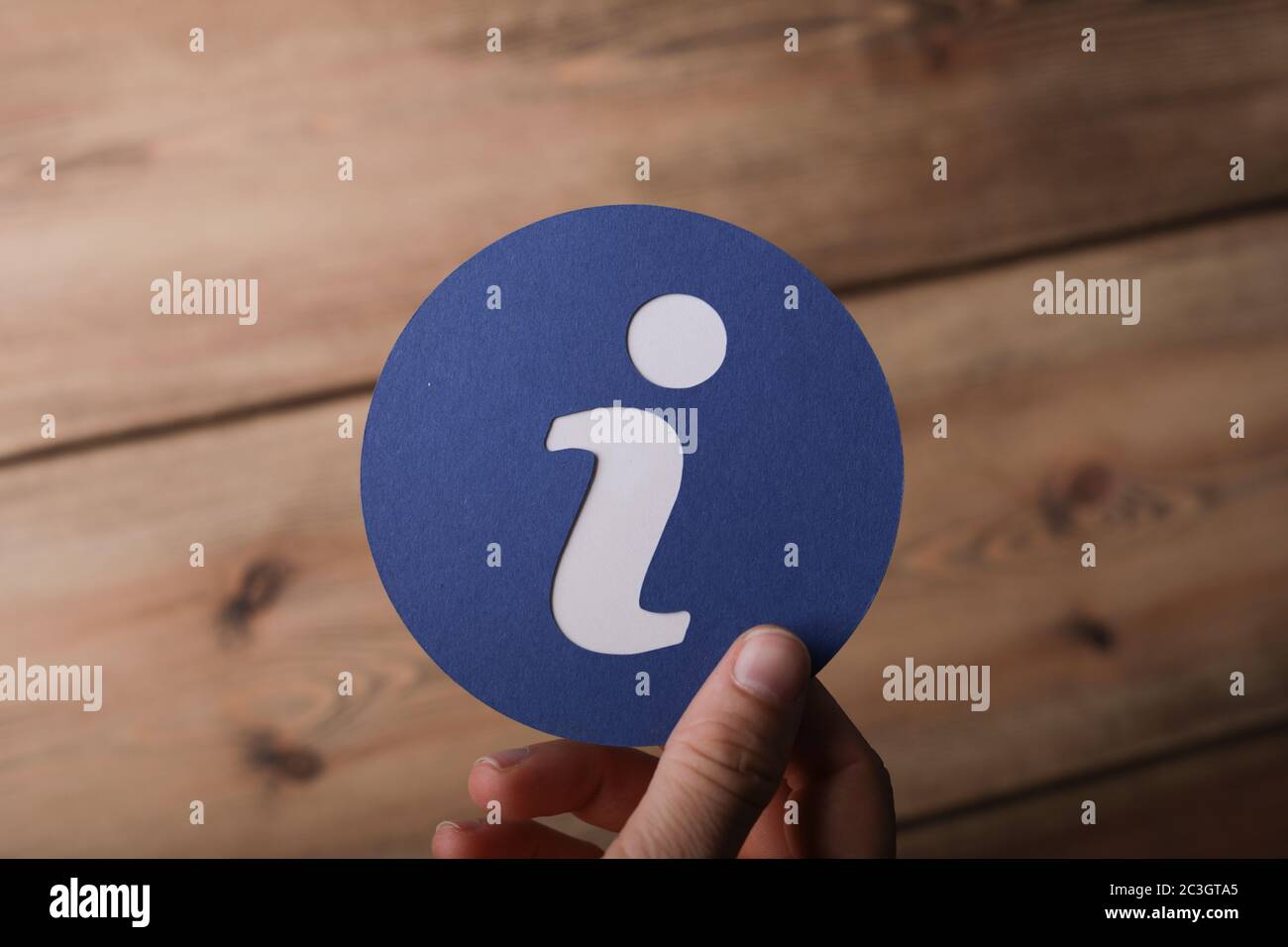Round information sign and a wooden floor on the background Stock Photo ...