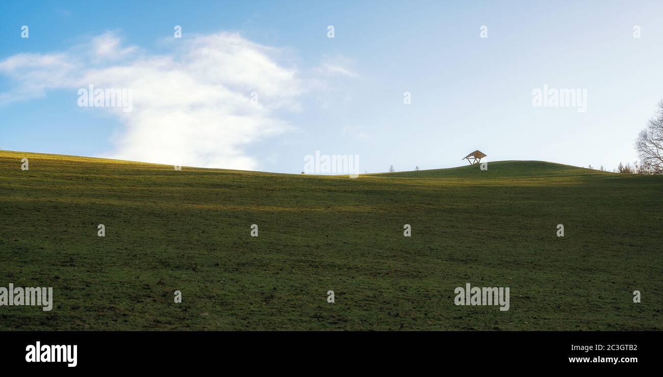 Hilly natural landscape and sky with lots of space Stock Photo - Alamy