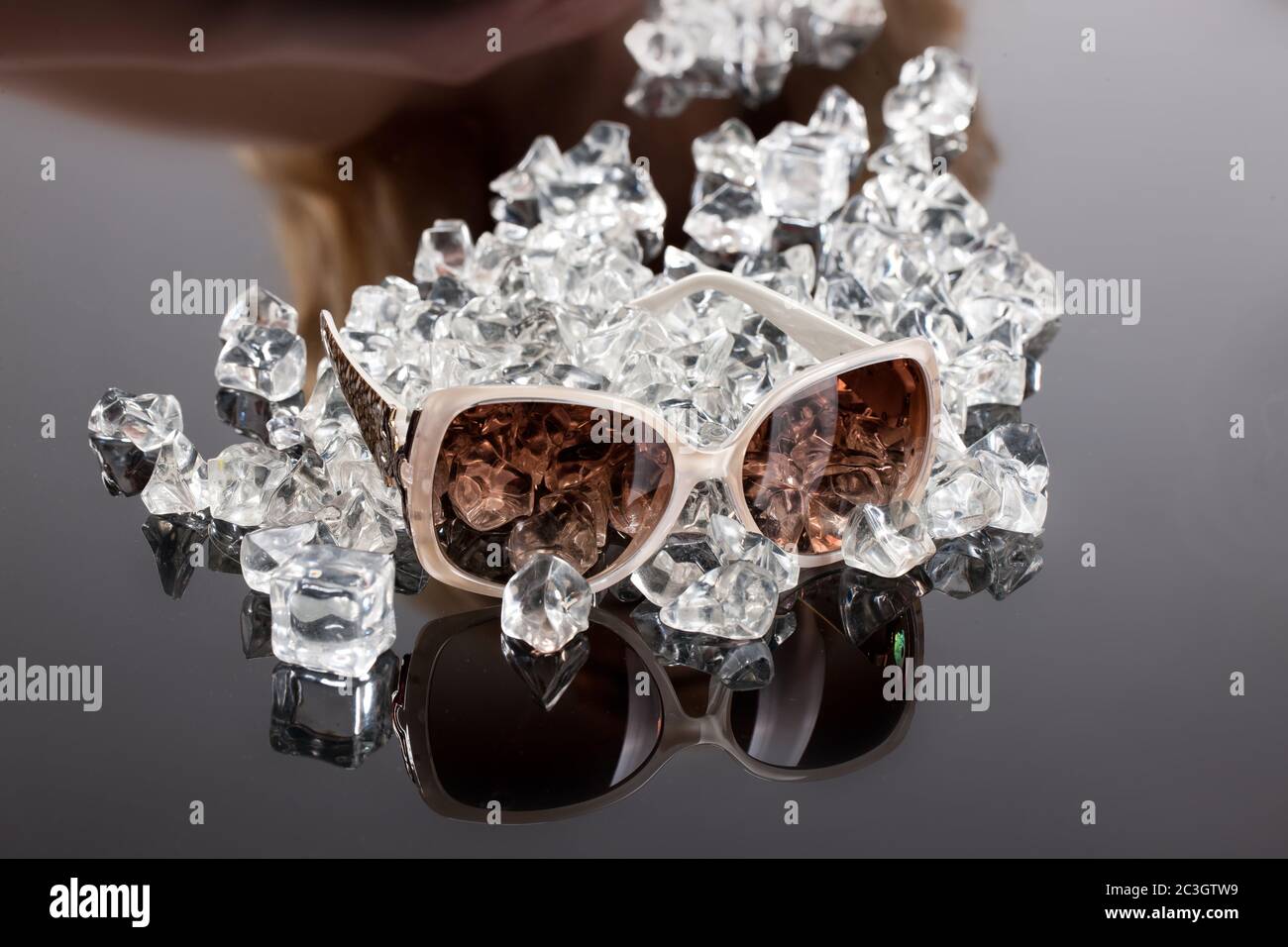 Sunglasses And Ice Stock Photo - Alamy