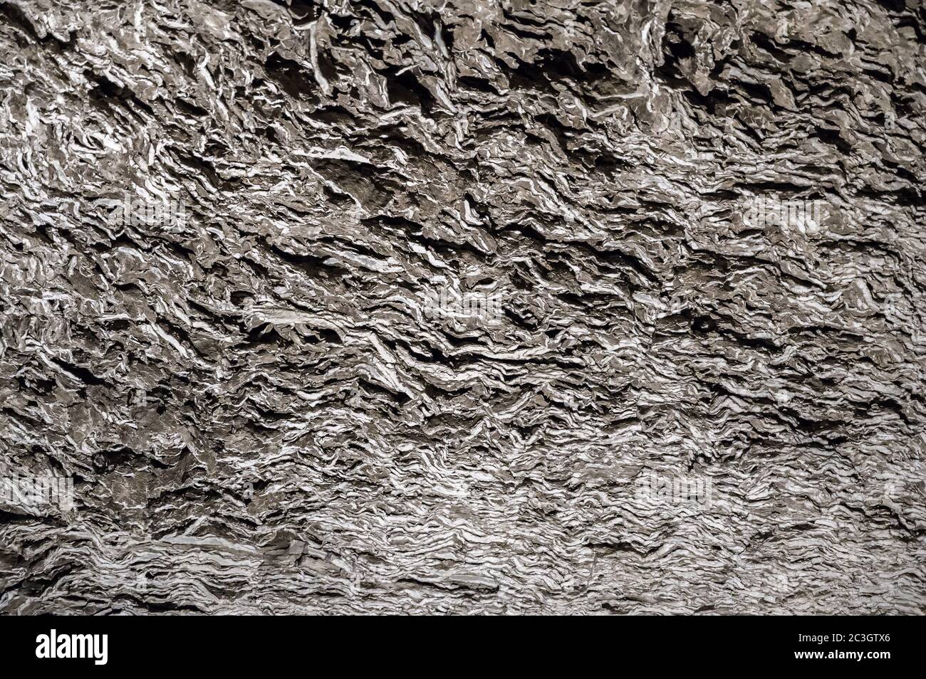 Gray texture from layers of rock and deposits Stock Photo - Alamy