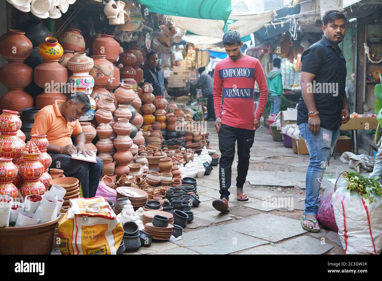 A shop selling pots. Khanderao Market is a sprawling market complex ...
