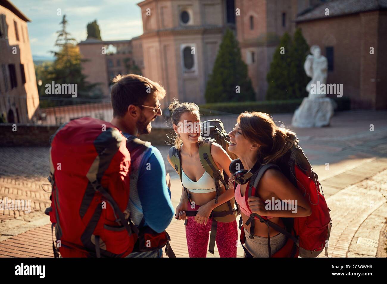 group of tourists with backpacks in italy, toscana Stock Photo - Alamy