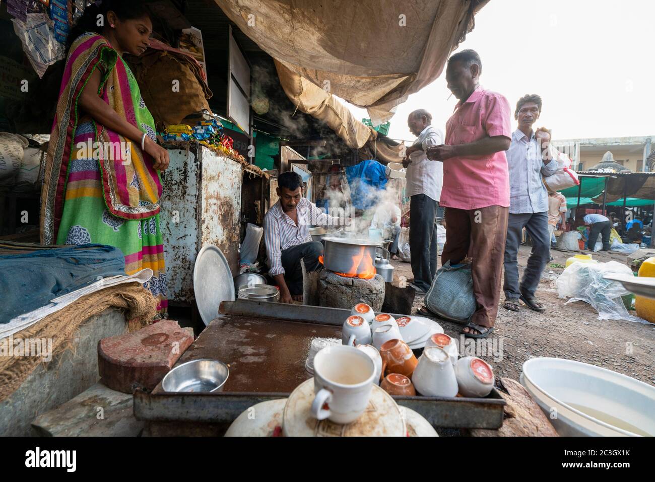 A busy tea stall within the Market. Khanderao Market is a sprawling ...