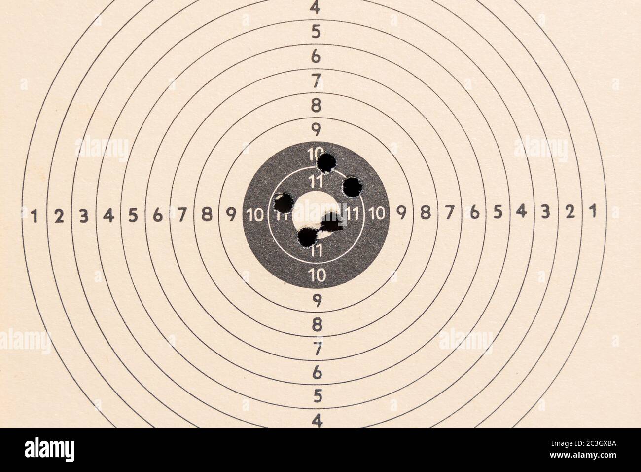 Air rifle Target Hit pattern Stock Photo - Alamy
