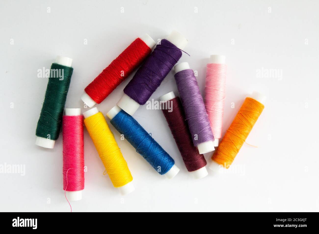 collage threads for sewing different colors Stock Photo - Alamy