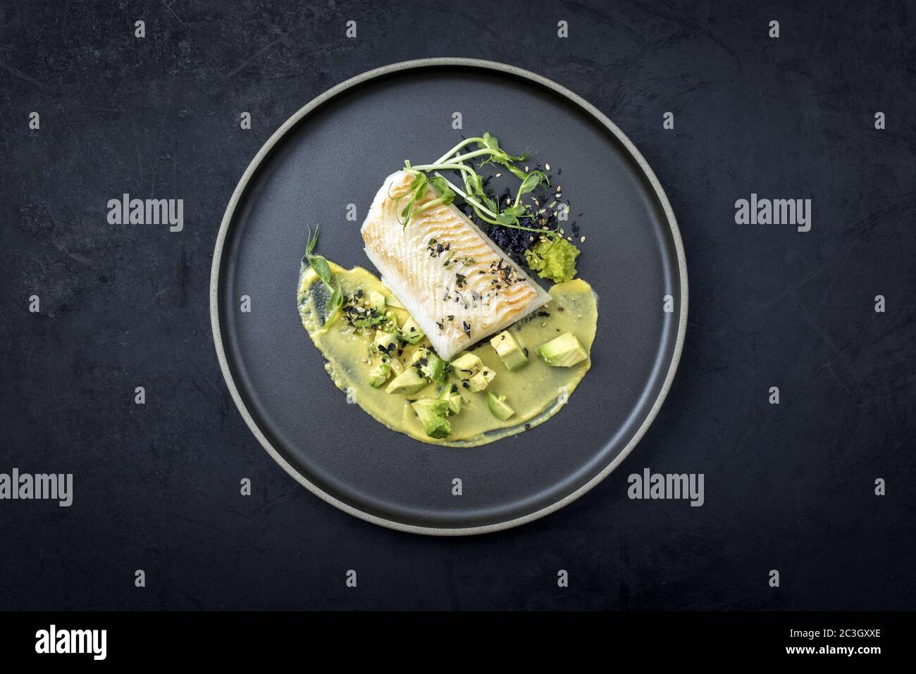 Gourmet fried cod fish filet with caviar Stock Photo - Alamy