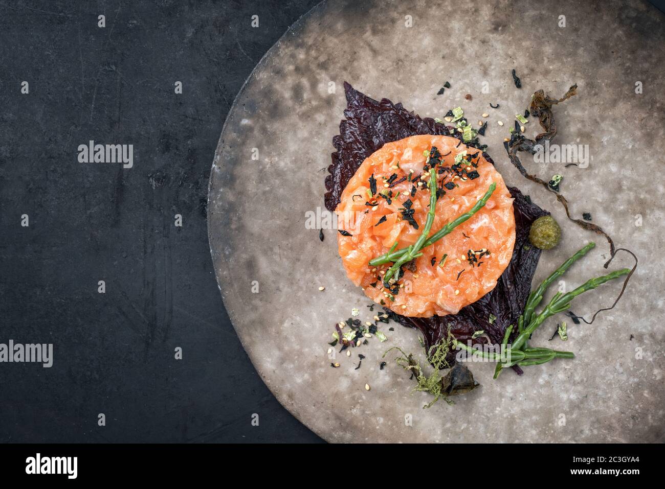 Gourmet salmon fish tartar raw from salmon fillet with glasswort Stock ...