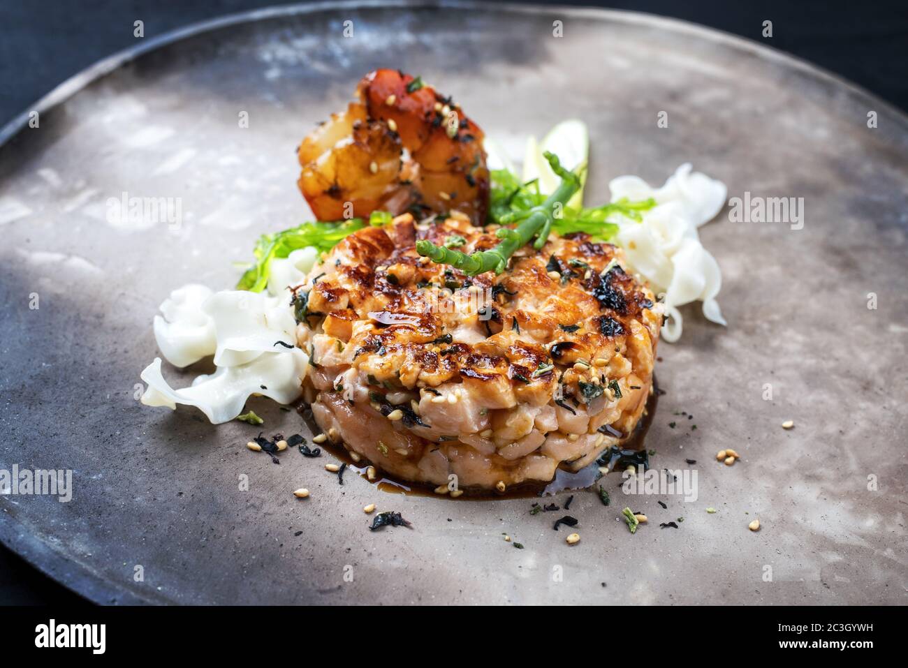 Gourmet salmon fish tartar raw from salmon fillet with glasswort Stock ...