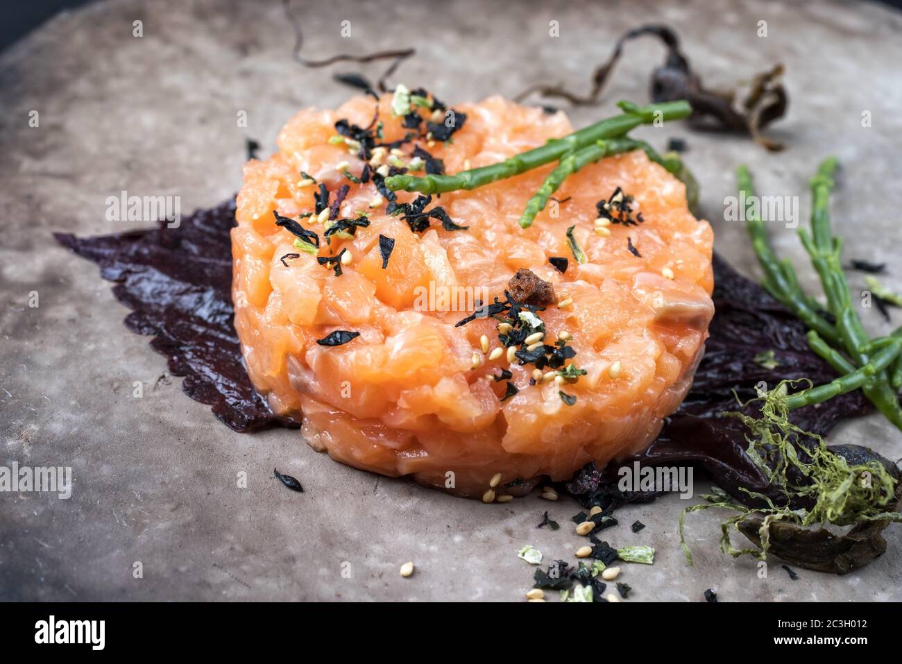 Gourmet salmon fish tartar raw from salmon fillet with glasswort Stock ...