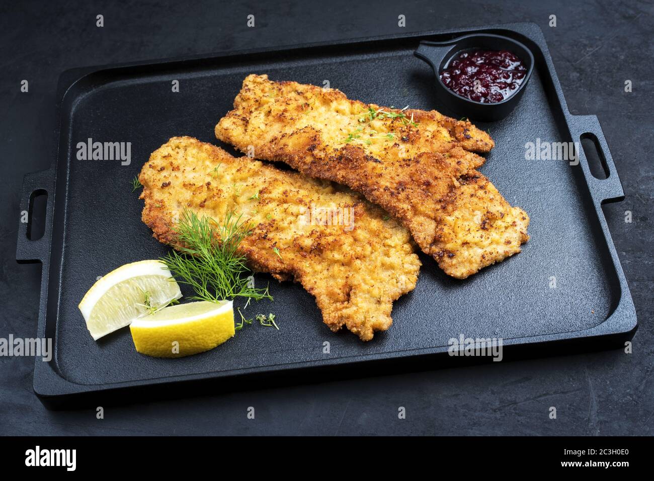 Traditional deep fried Wiener schnitzel from veal topside with ...