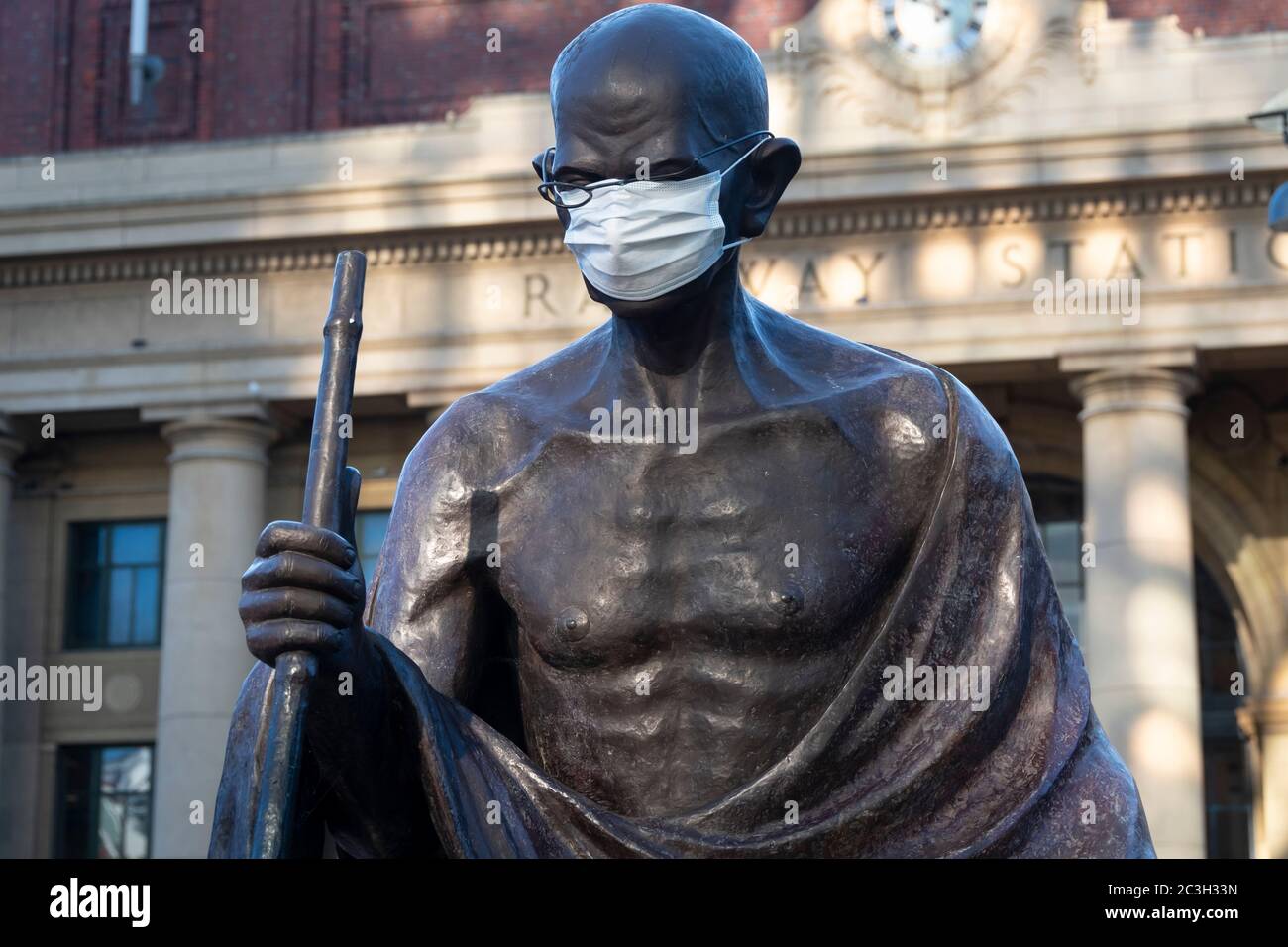 Statue of Gandhi wearing a medical face mask during the Covid19 ...