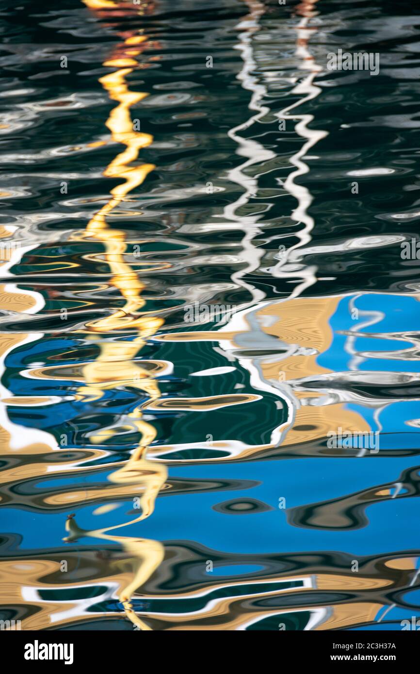 Reflection of building on wharf, Wellington harbour, North Island, New ...