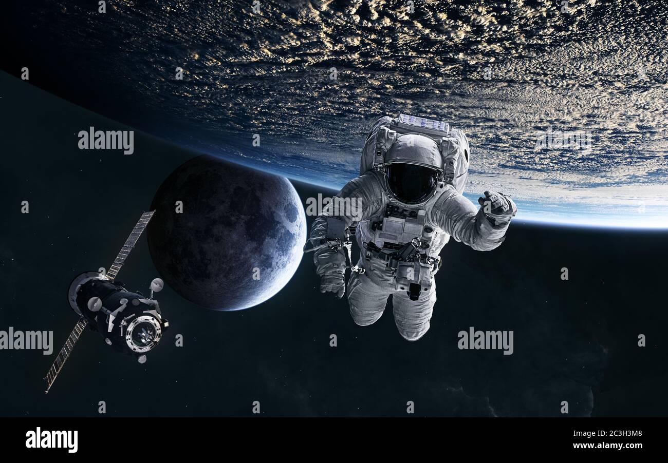 Astronaut, ISS in low Earth orbit. Moon. Solar system Stock Photo - Alamy