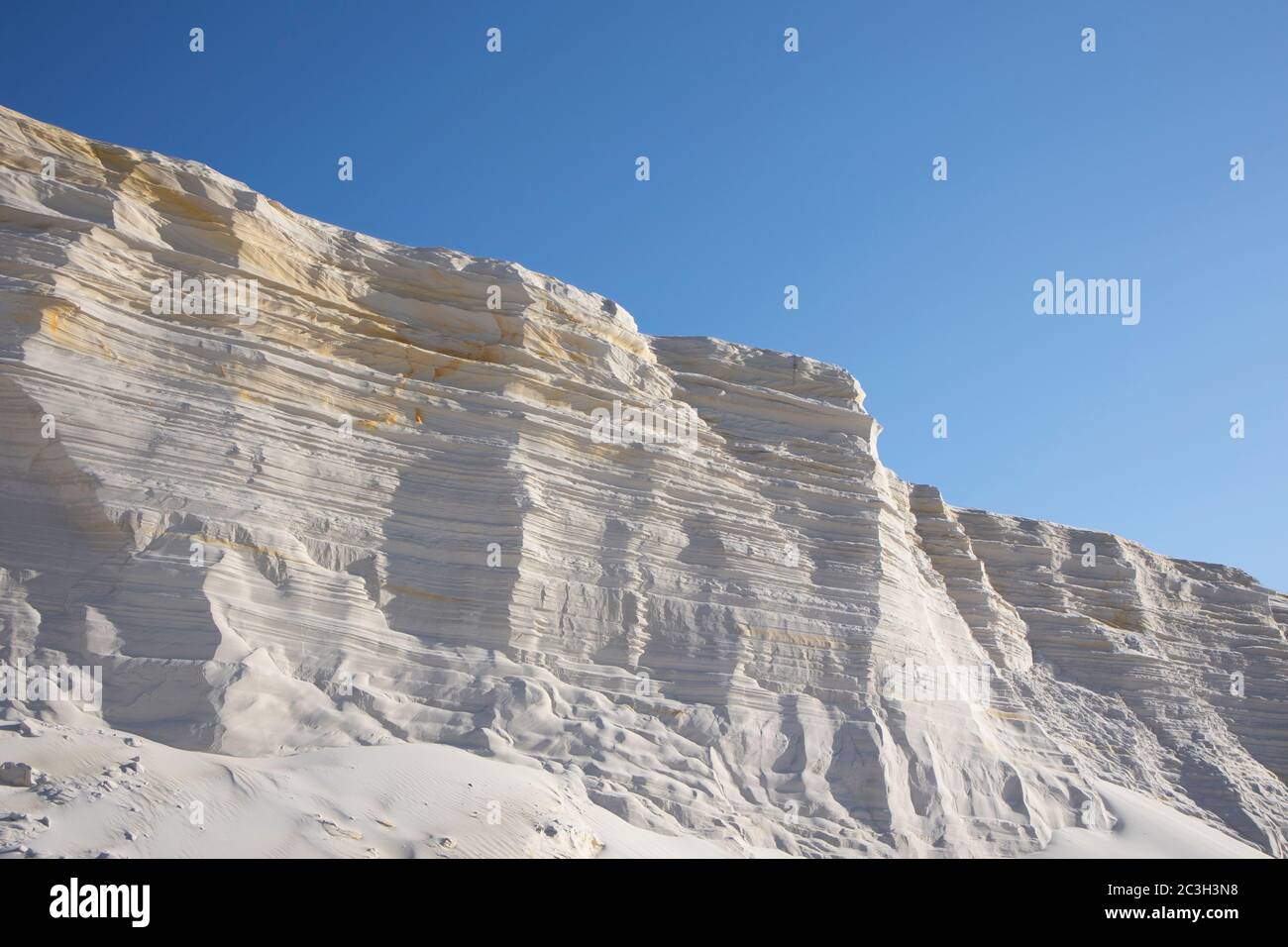 White sand and blue sky. Embossed sand mountains of white sands. Desert ...