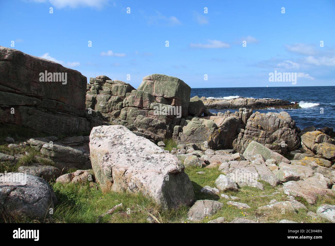 Beautiful rocks during daytime in Danish island, Bornholm Stock Photo ...