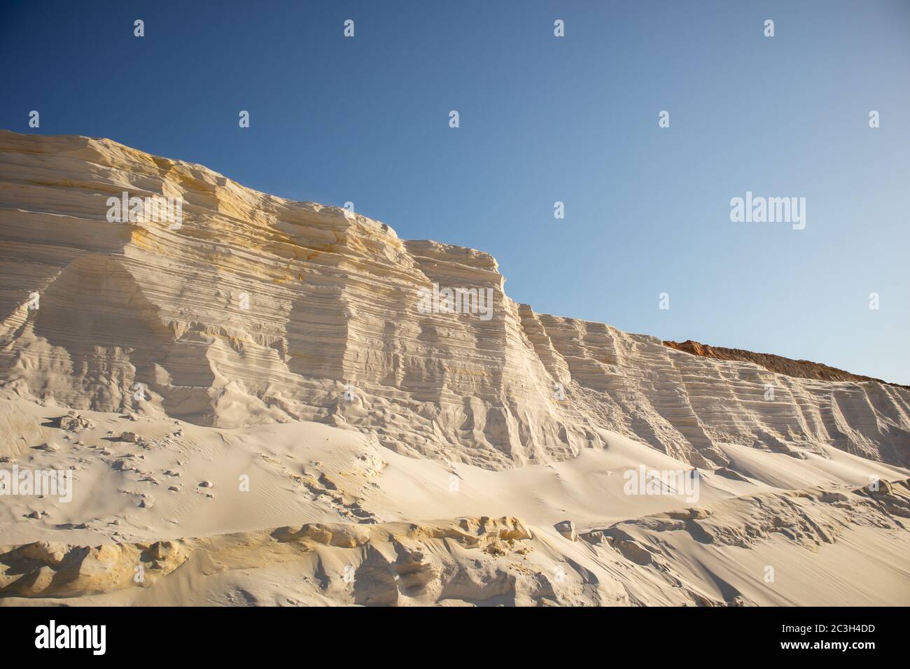 White sand and blue sky. Embossed sand mountains of white sands. Desert ...