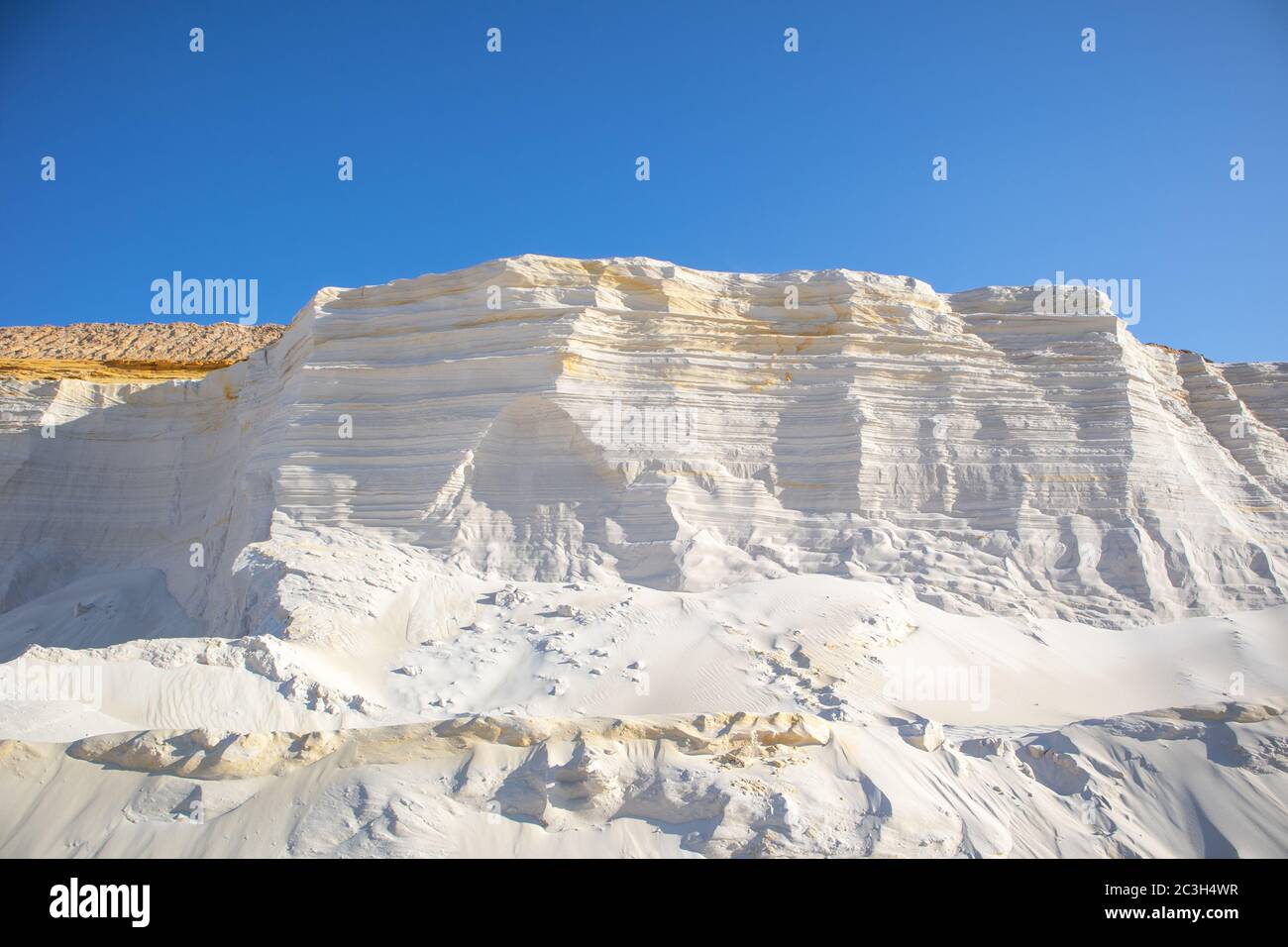 White sand and blue sky. Embossed sand mountains of white sands. Desert ...