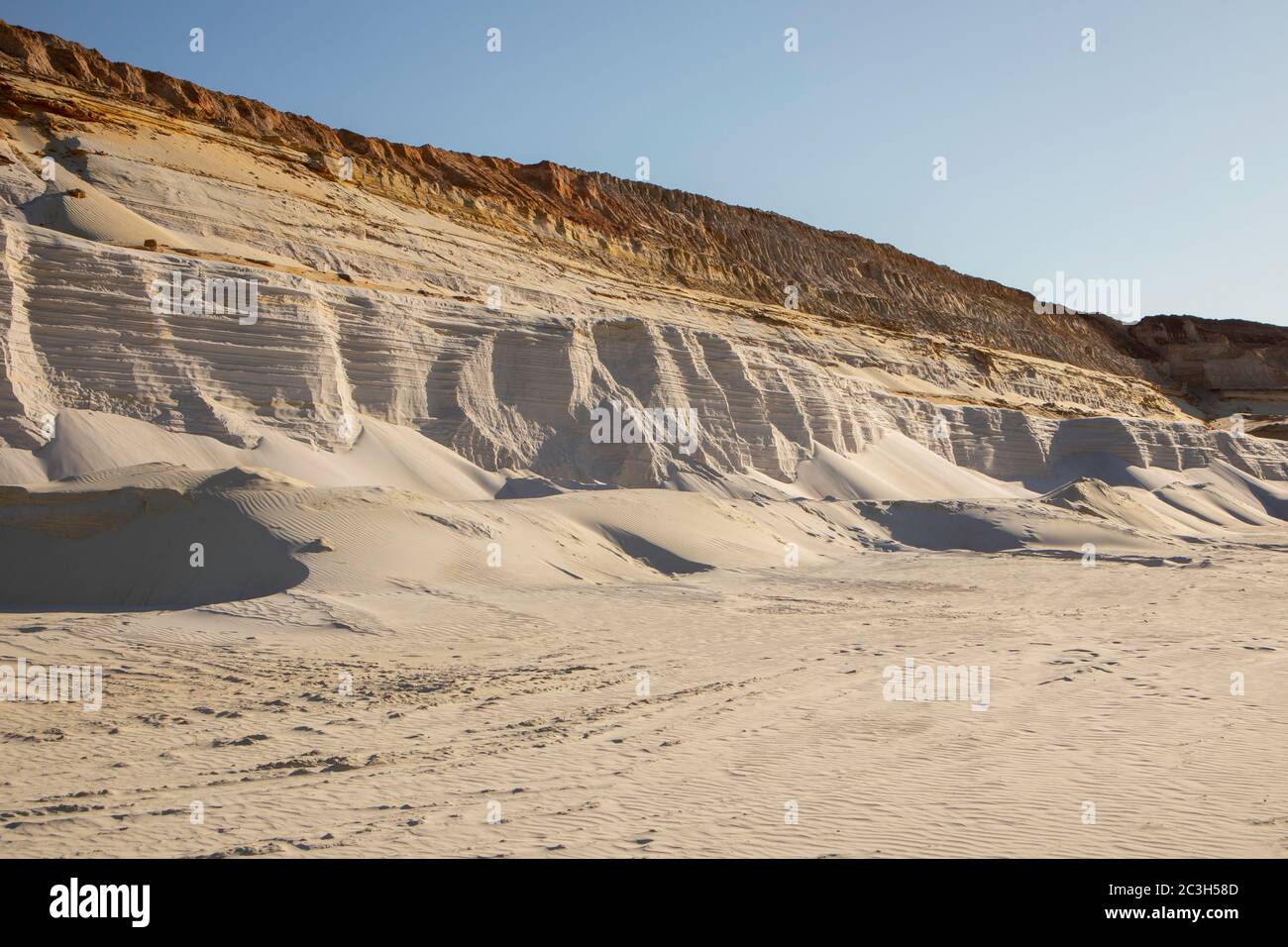 White sand and blue sky. Embossed sand mountains of white sands. Desert ...
