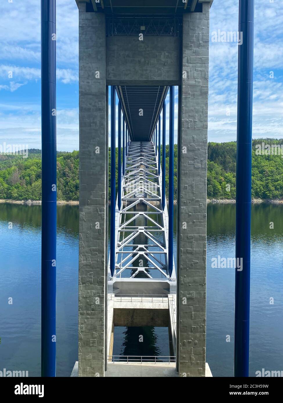 The Zdakov Bridge is a steel arch bridge that spans the Vltava river ...