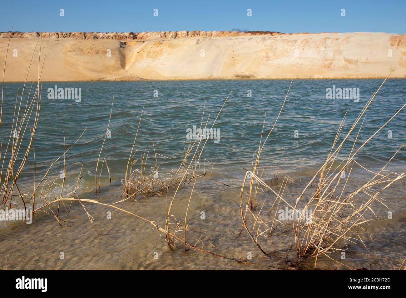 Pond in the sand quarry. Pond on a sand quarry Stock Photo - Alamy
