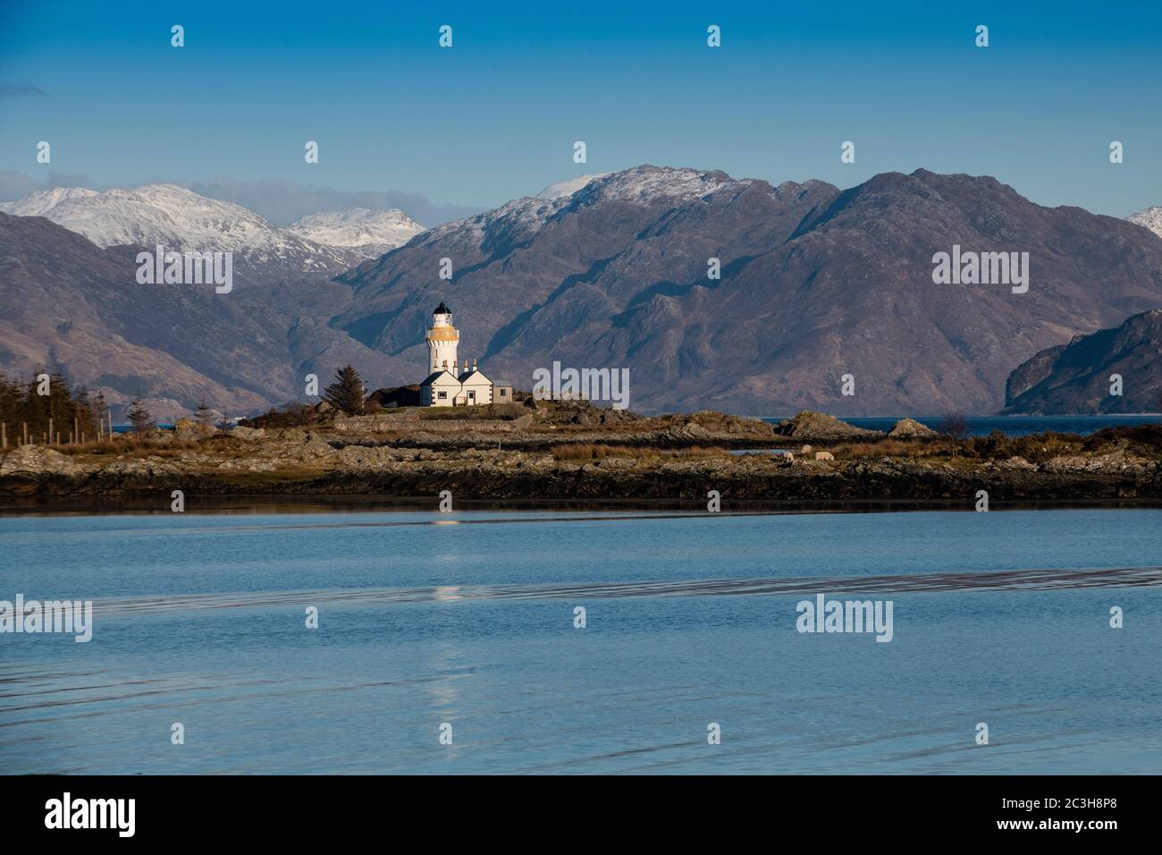 Ornsay Lighthouse on the Island of Ornsay from the Isle of Skye. Inner ...
