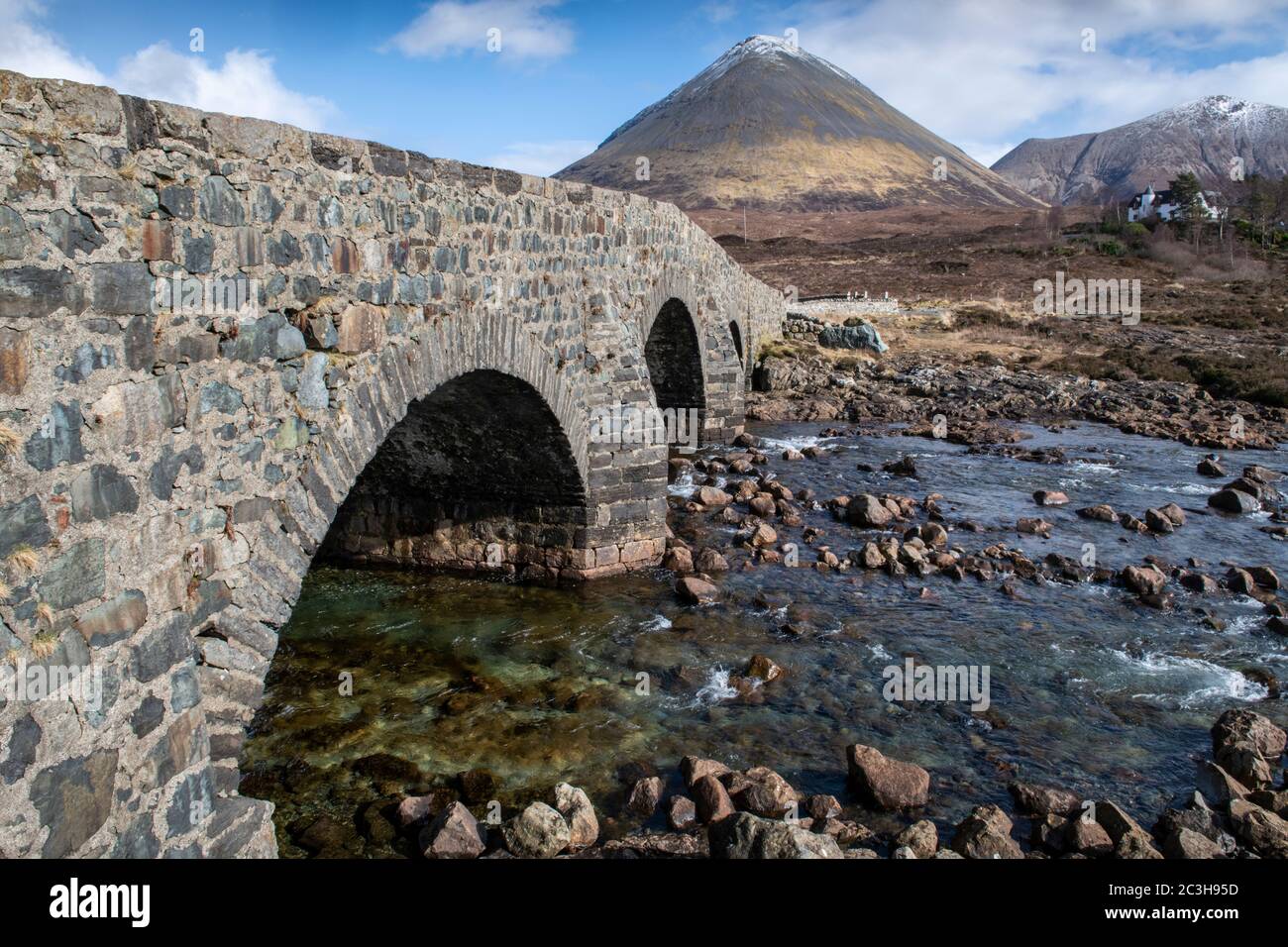 The famous Sligachan Old Bridge looking towards the Cuillin mountain ...