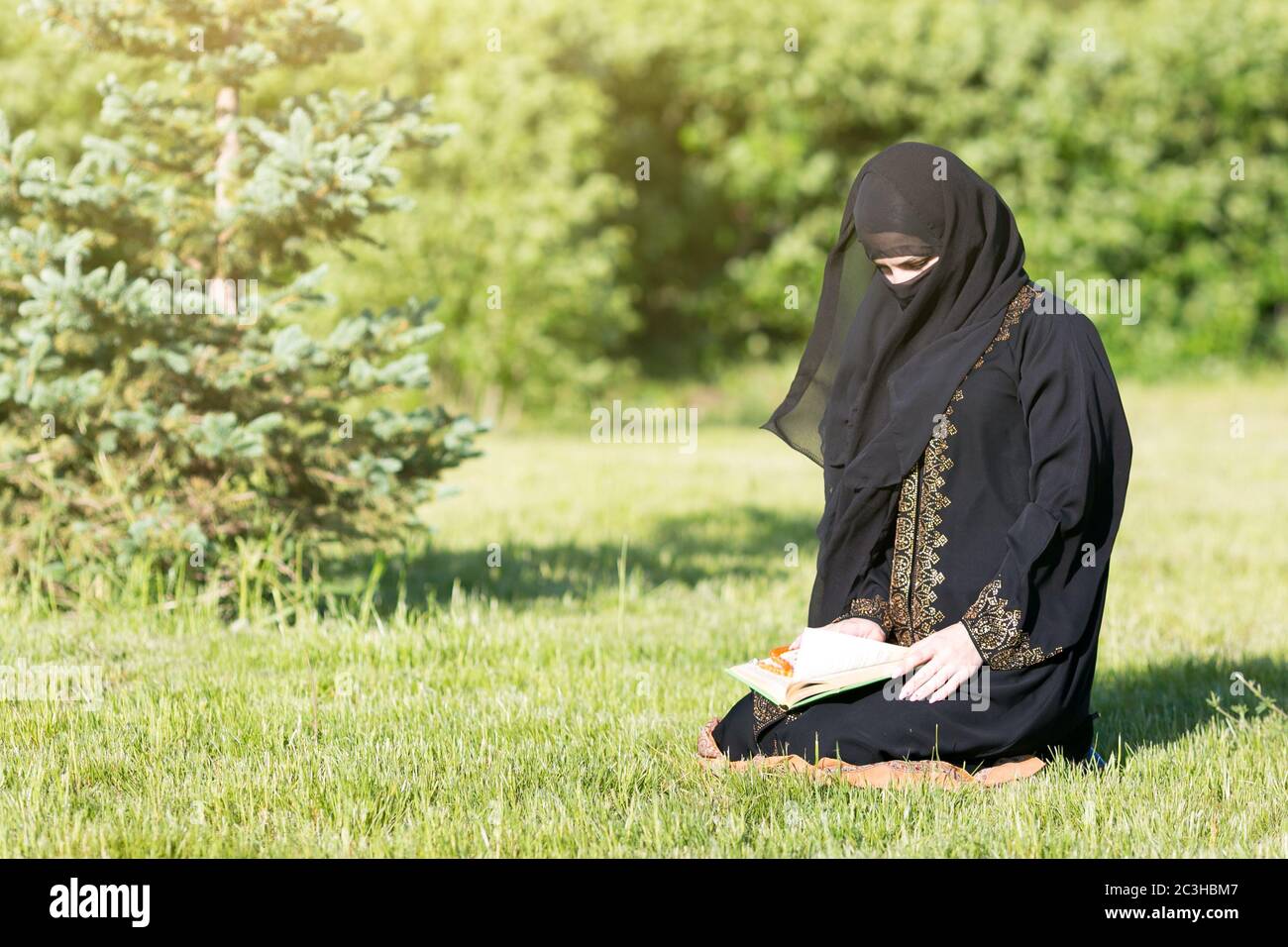 Muslim Woman Sitting On Prayer High Resolution Stock Photography and ...