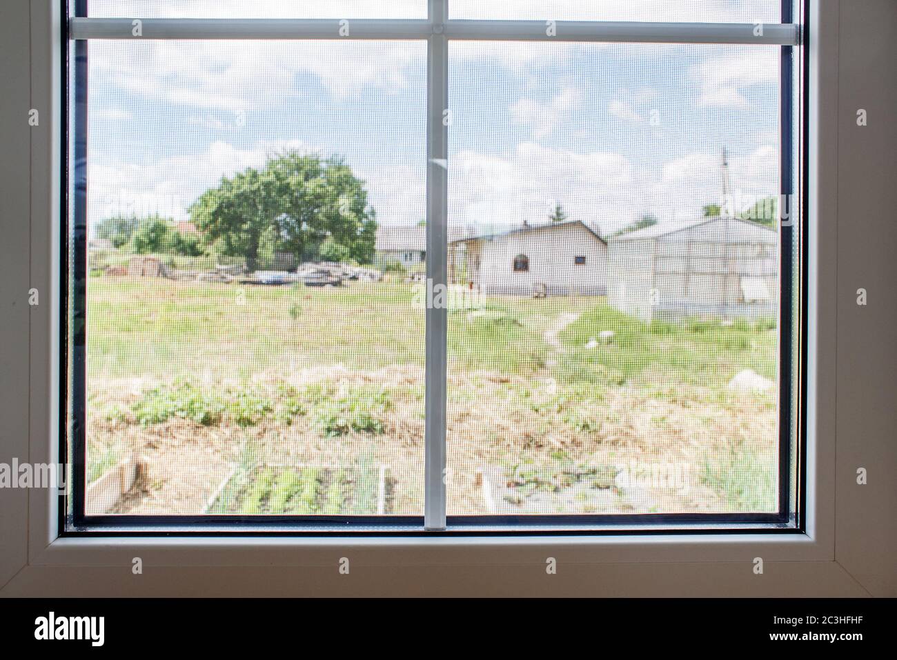 plastic window with mosquito net indoor closeup Stock Photo - Alamy