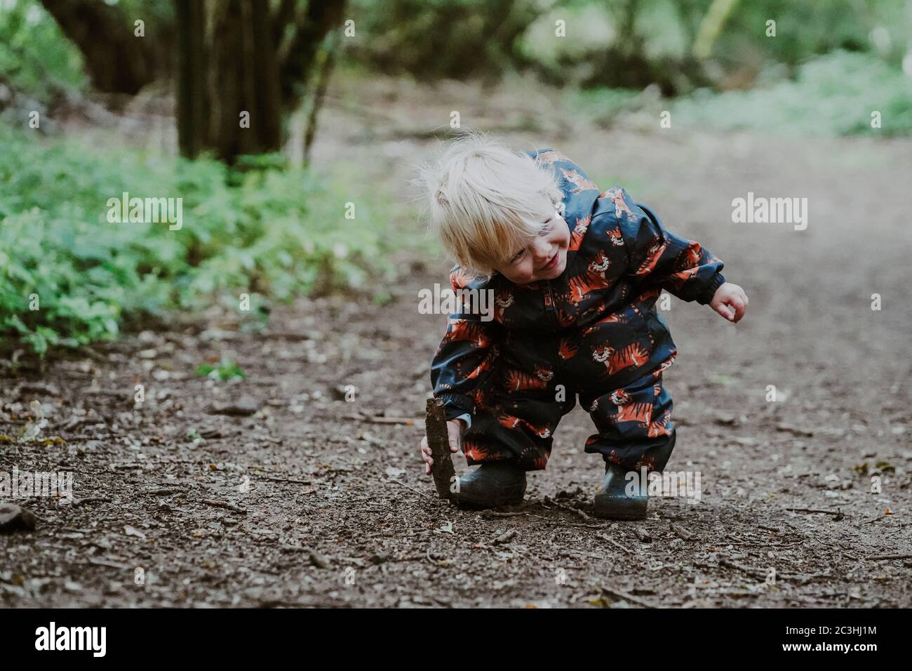 Children playing forest sticks hi-res stock photography and images - Alamy