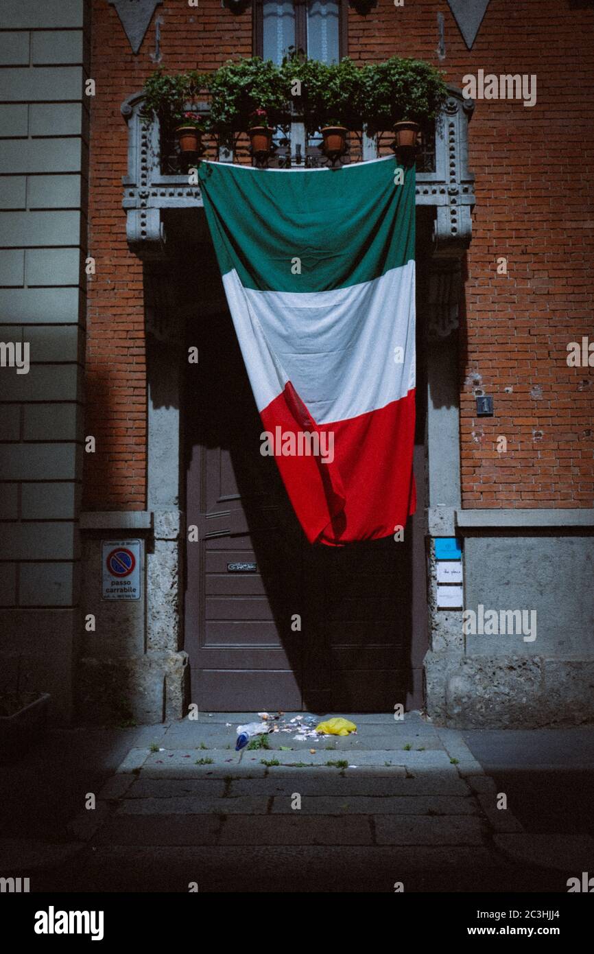 Vertical shot of the entrance of a beautiful house with the Italian ...