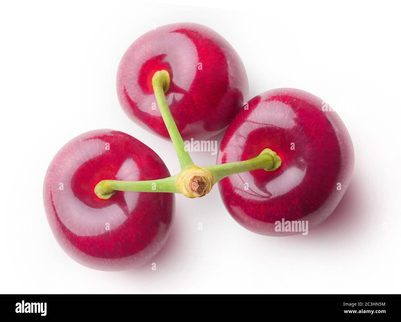 Isolated cherries from above. Top view of three cherries on one stem ...
