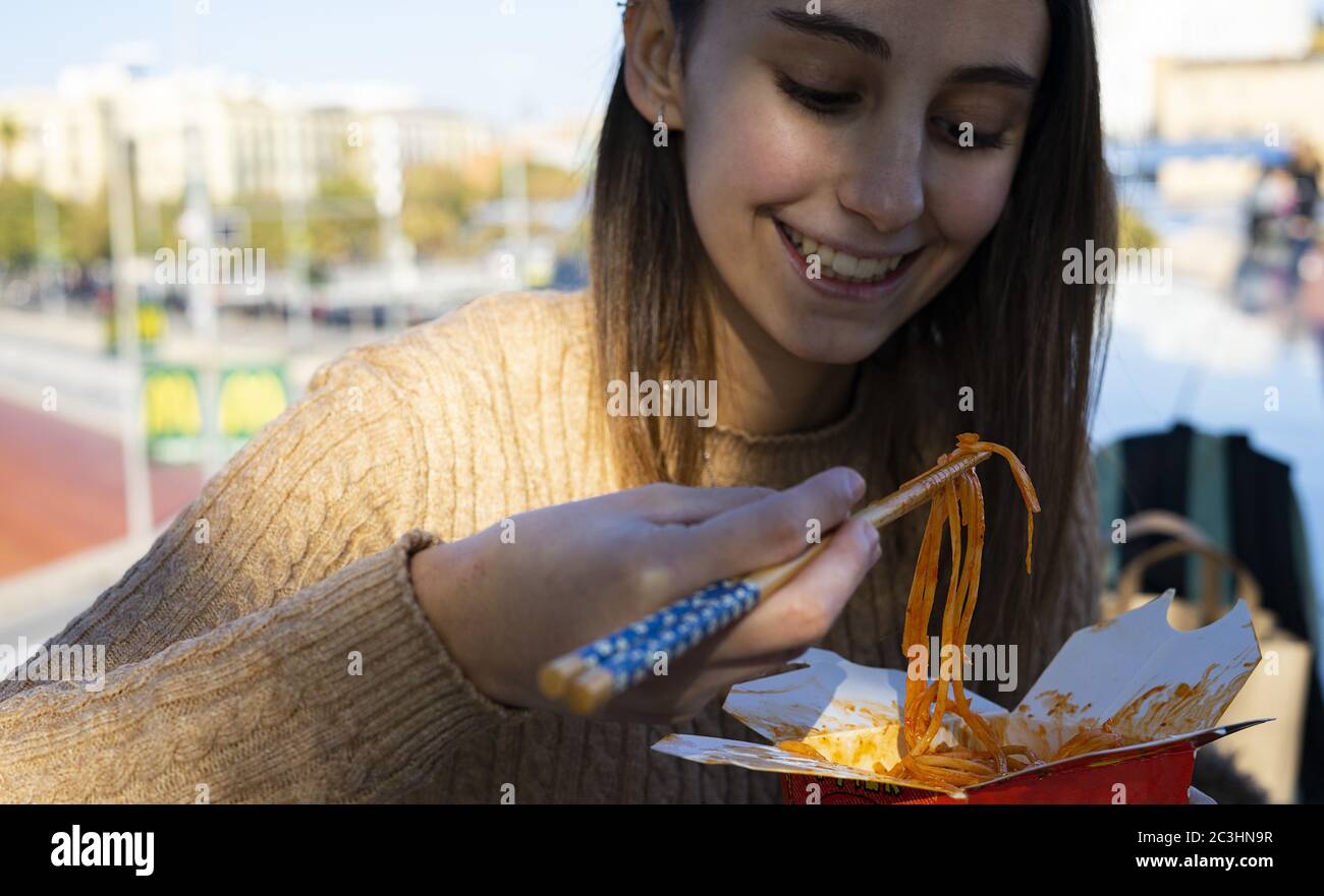 Young women eating at a chinese restaurant hi-res stock photography and ...
