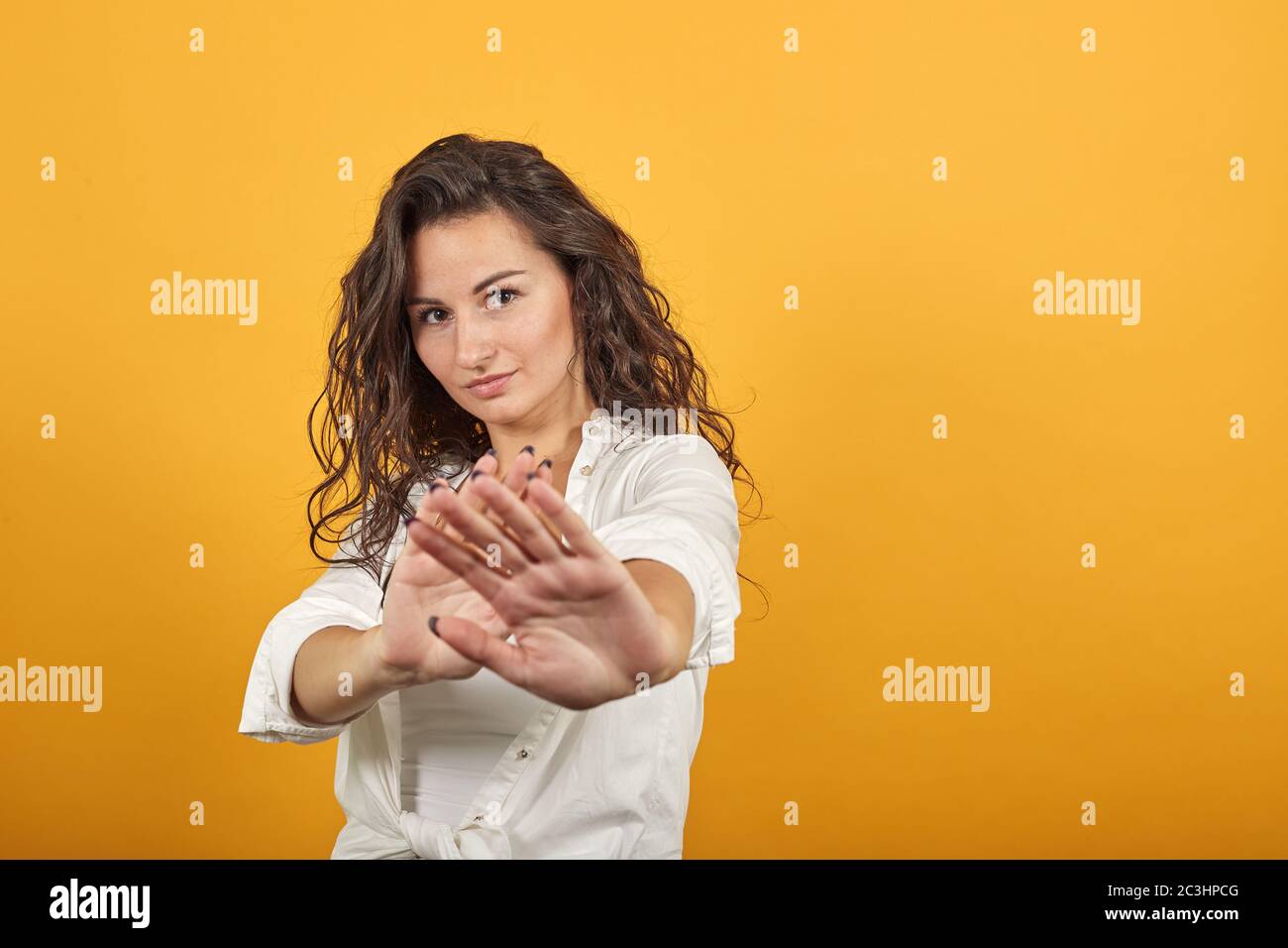 Palm arm raised air angry look straight you will not pass through ...