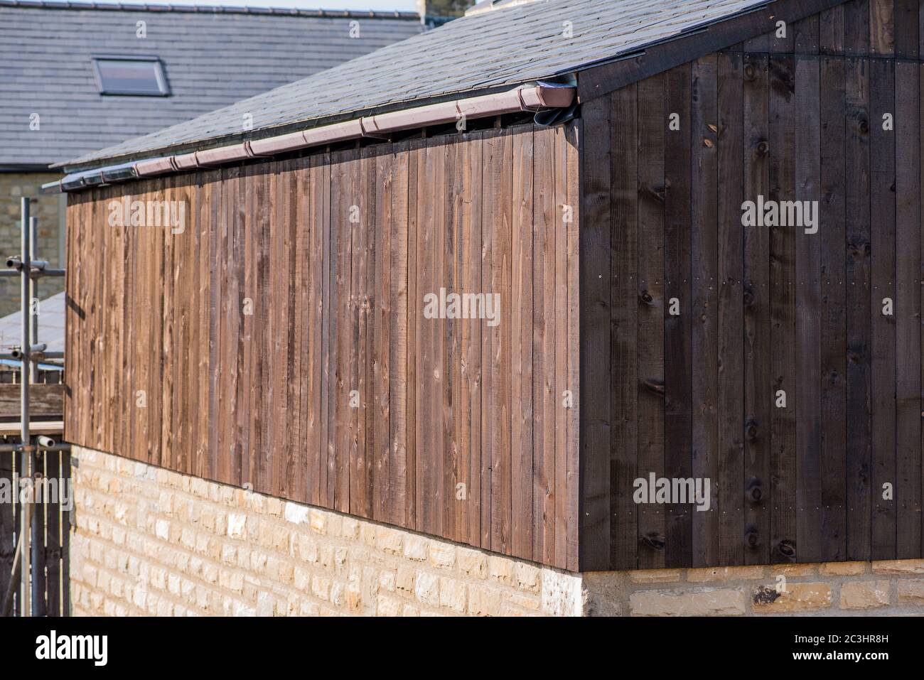 Timber building cladding Stock Photo - Alamy