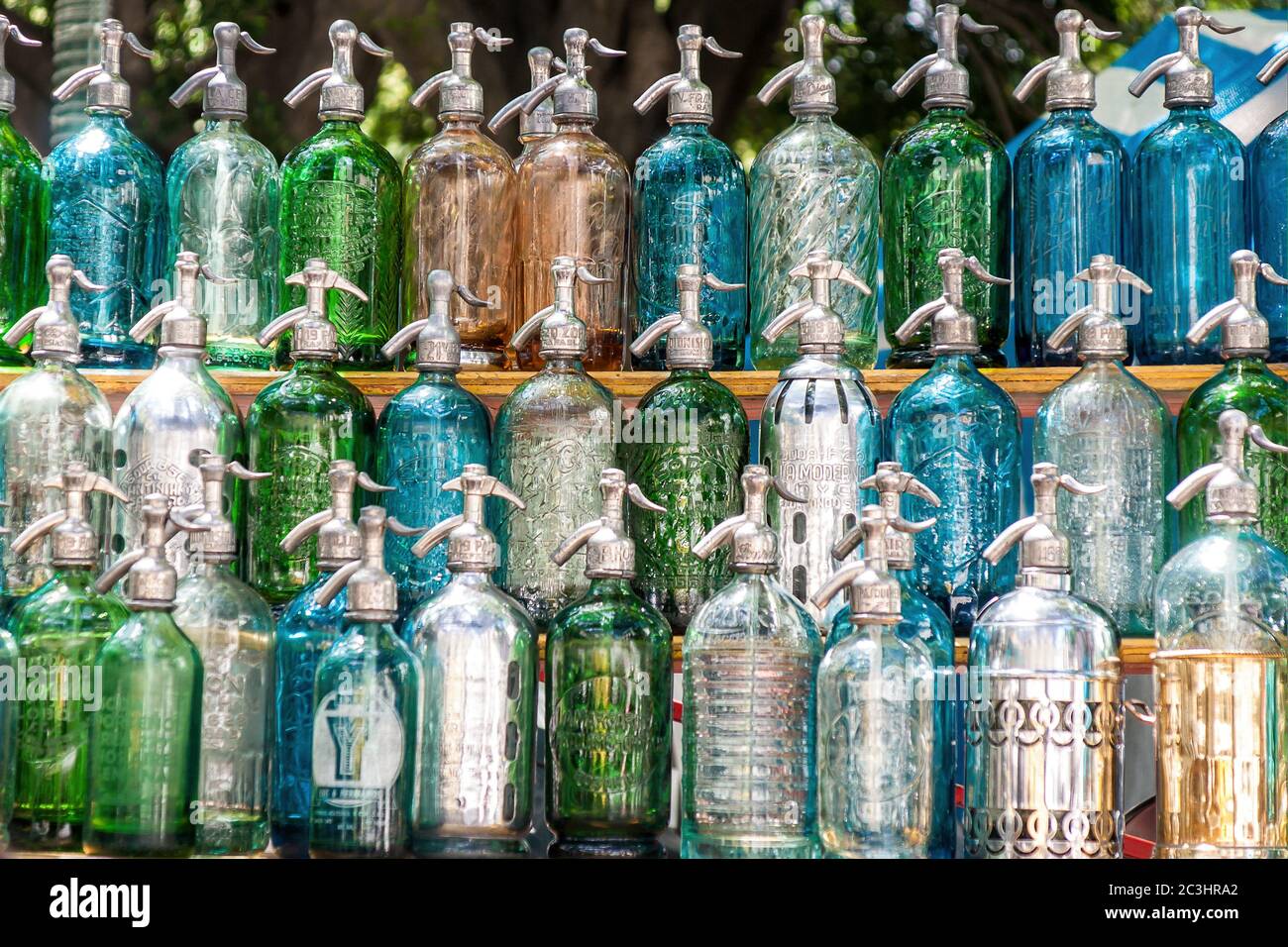 Closeup shot of colorful old glass spray bottles Stock Photo - Alamy