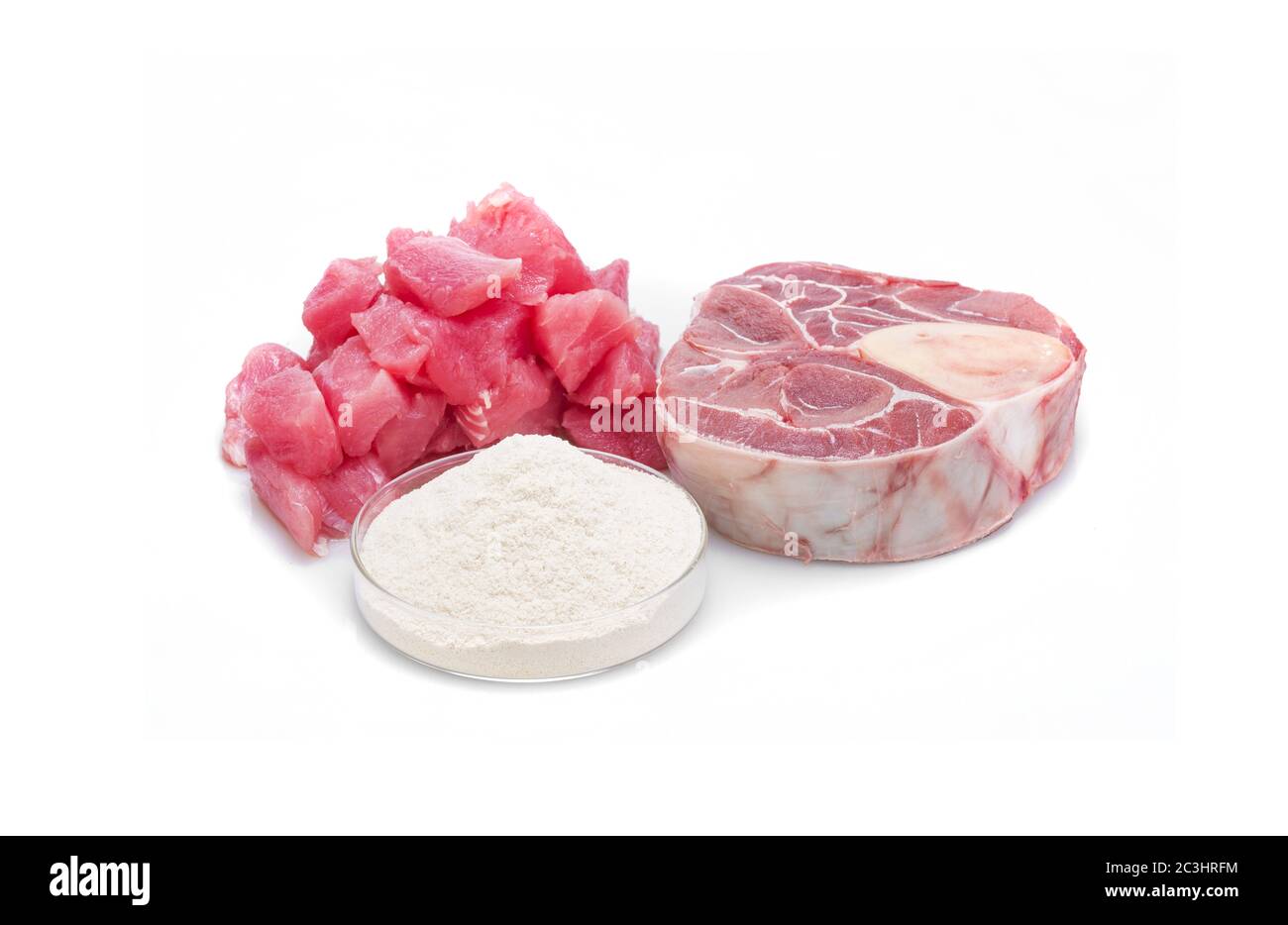 Raw meat pieces and flour in a small container under the lights ...