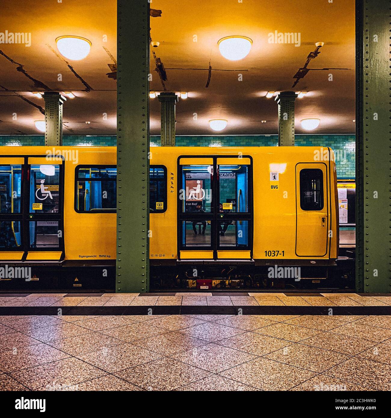 Modern yellow subway waiting for passengers Stock Photo - Alamy