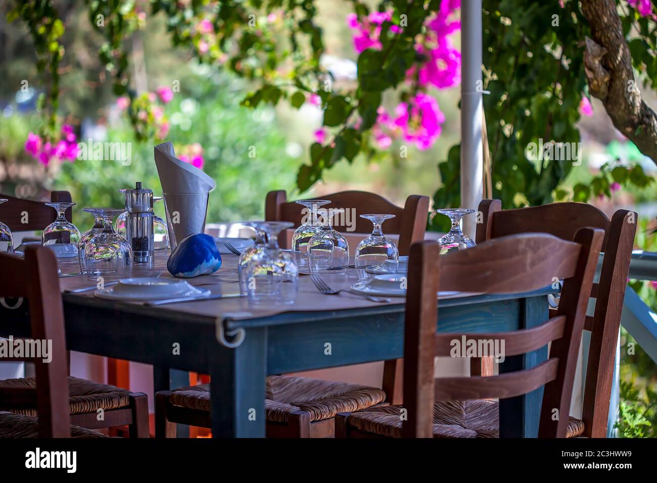 Lunch Table Set Up. Isolated. Summertime in Greece outdoor garden table ...