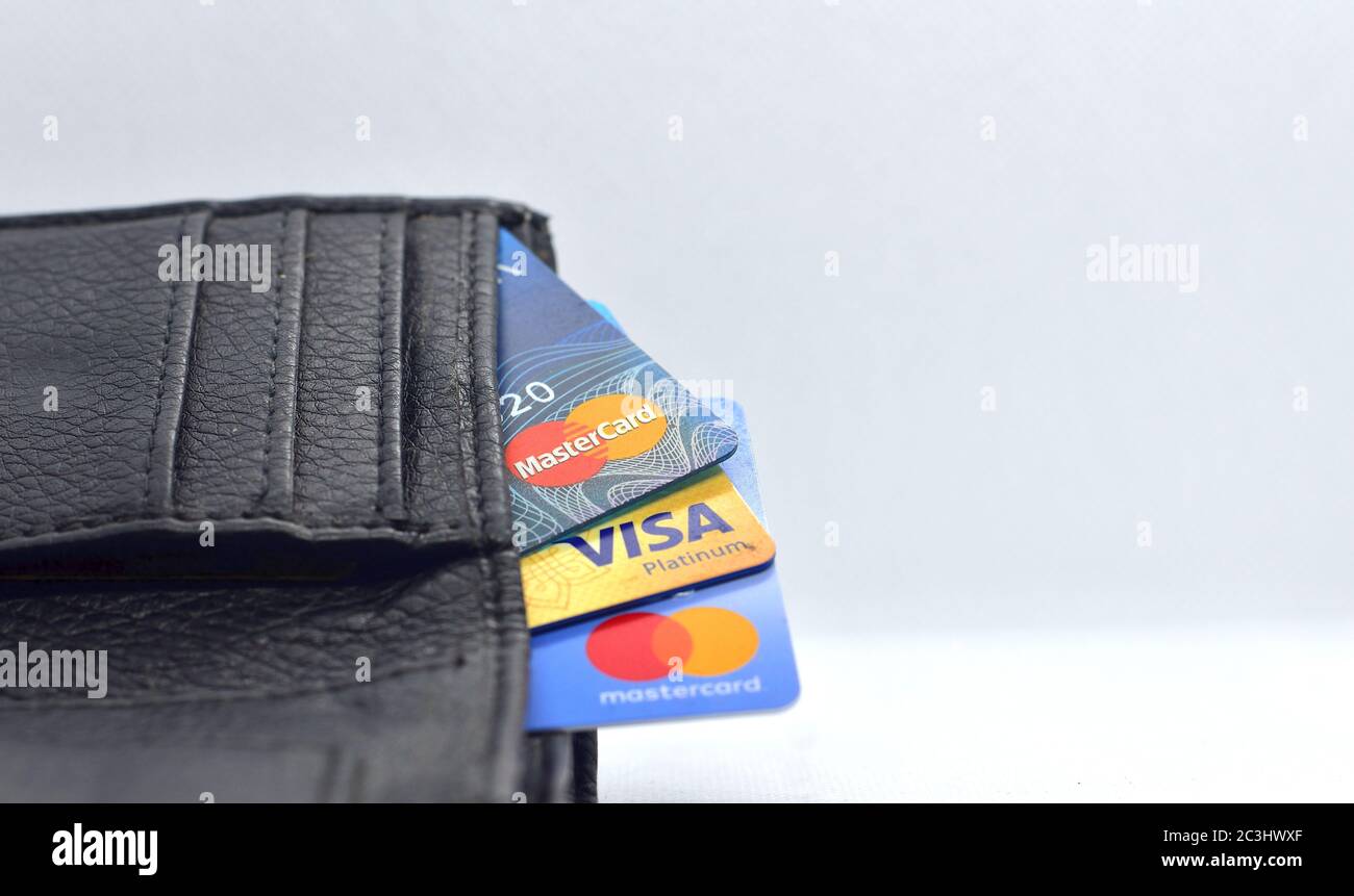Debit and Credit cards in wallet on white background. side view Stock ...