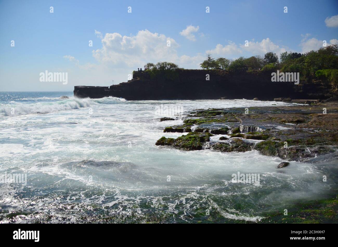 Tanah Lot is a rock formation off the Indonesian island of Bali. It is ...