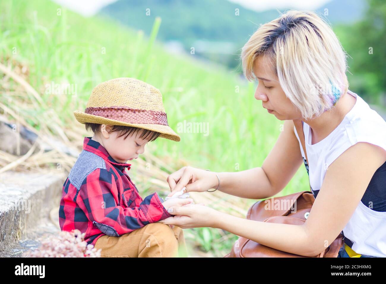 Two asian kids in playground hi-res stock photography and images - Alamy
