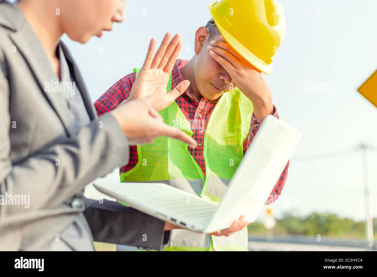 A man raise hands up for stop and give up. Foreman afraid manager at ...