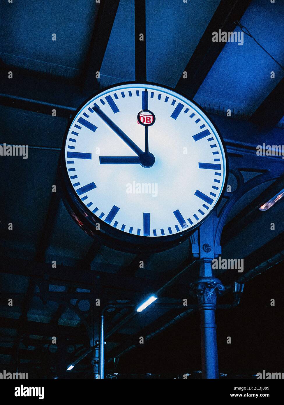 Closeup shot of street clock showing the time. seven minutes to nine in ...