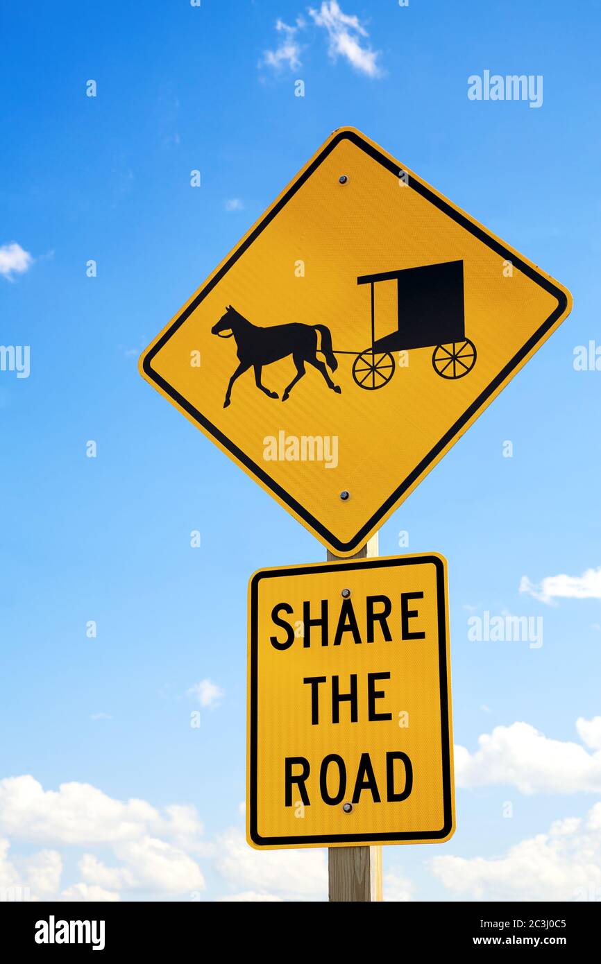 A road sign warning drivers to share the road with the local Amish ...