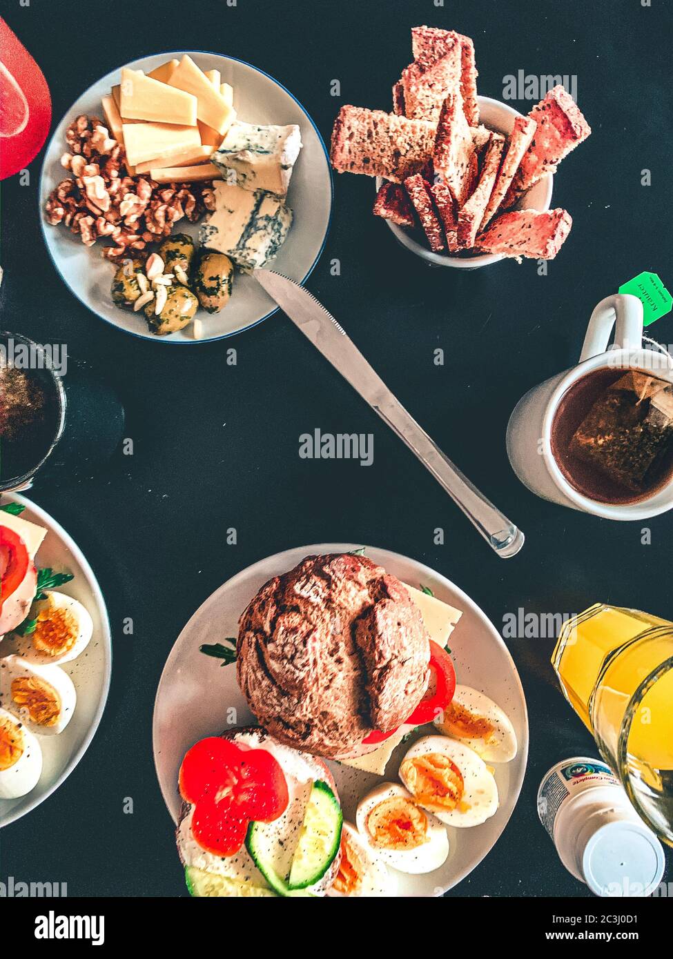 Vertical top view of a breakfast table full of healthy food Stock Photo ...