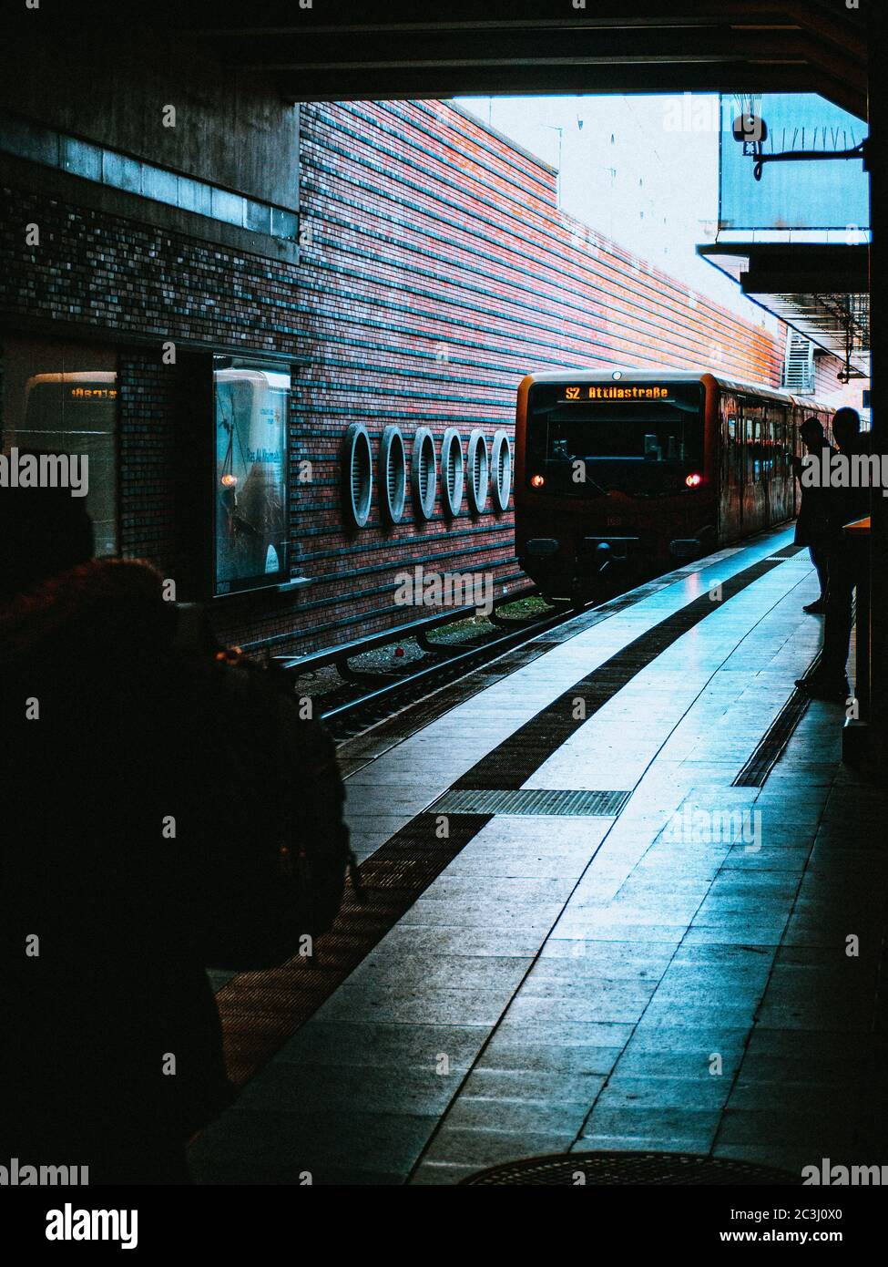 Vertical view of a train in the railway station Stock Photo - Alamy